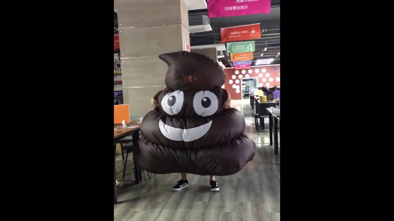 Giant inflatable poop emoji makes us so happy. - YouTube