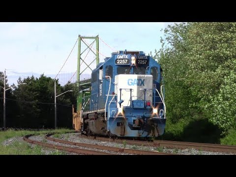GMTX EMD GP38-2 2257 leads CN Transfer Train 507 at Africville, NS ...