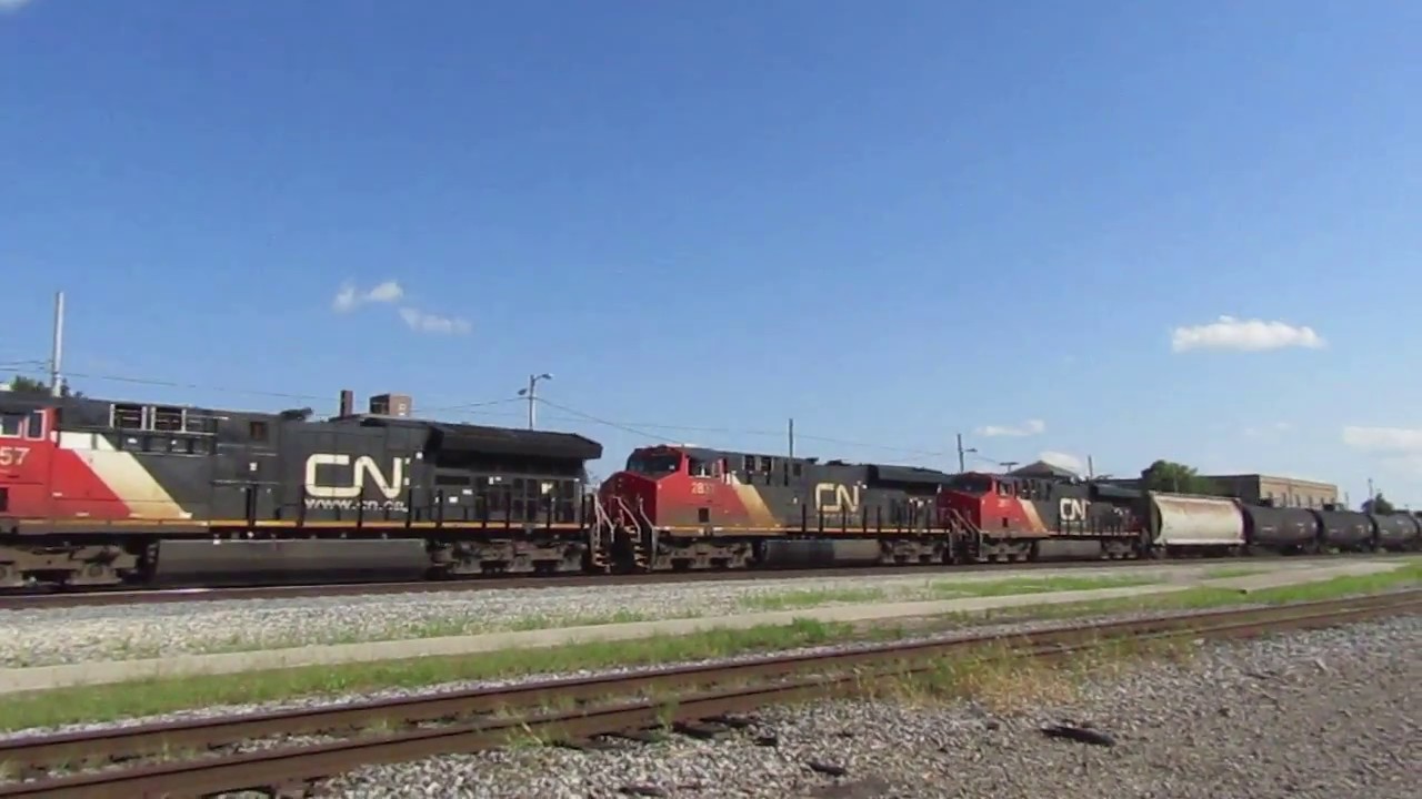 Three Elephant Styled Canadian National Engines Pull CN Oil Train - YouTube