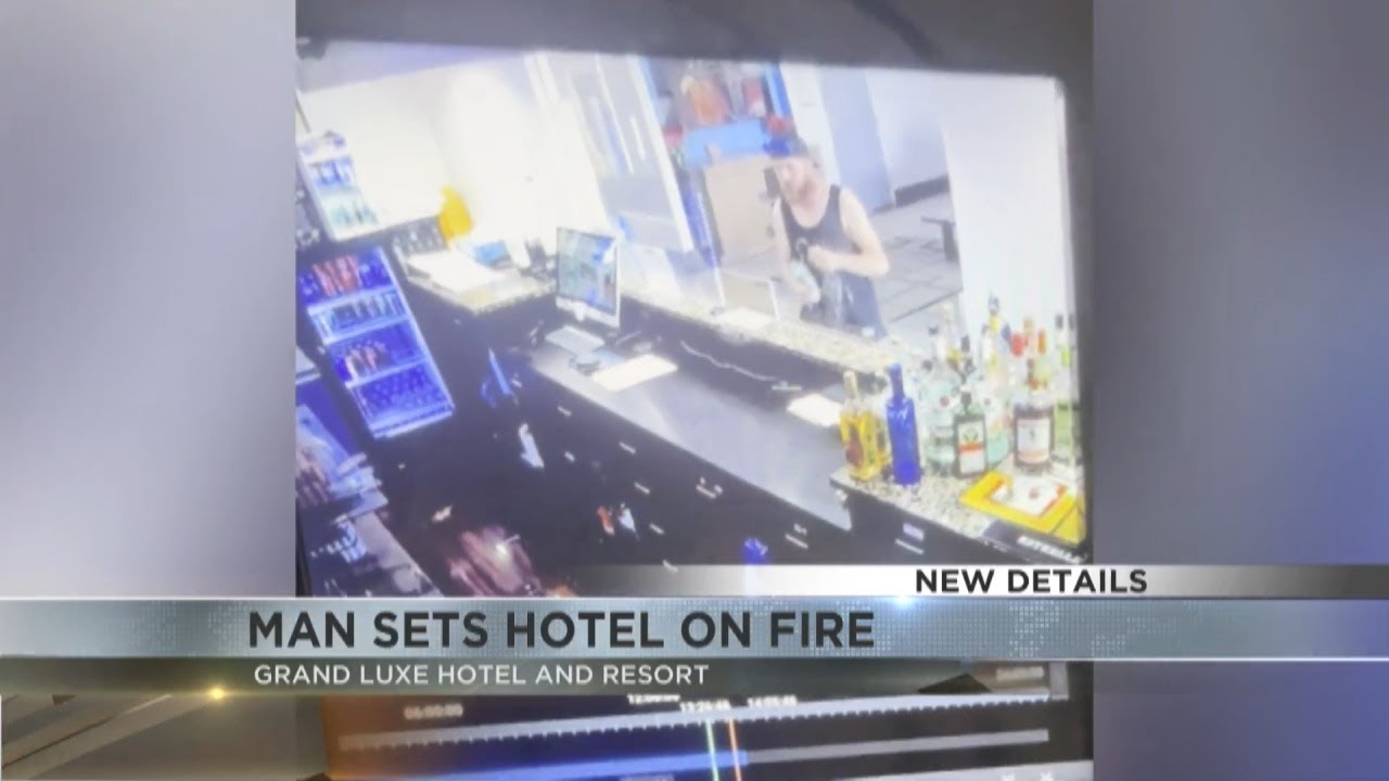 Man sets hotel reception desk on fire - YouTube
