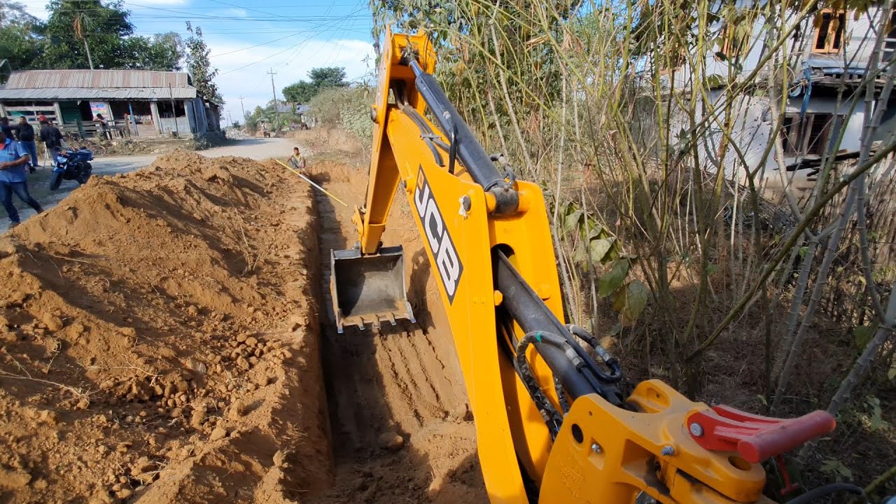 JCB Backhoe Working For Road Construction - JCB Making Drain View From ...