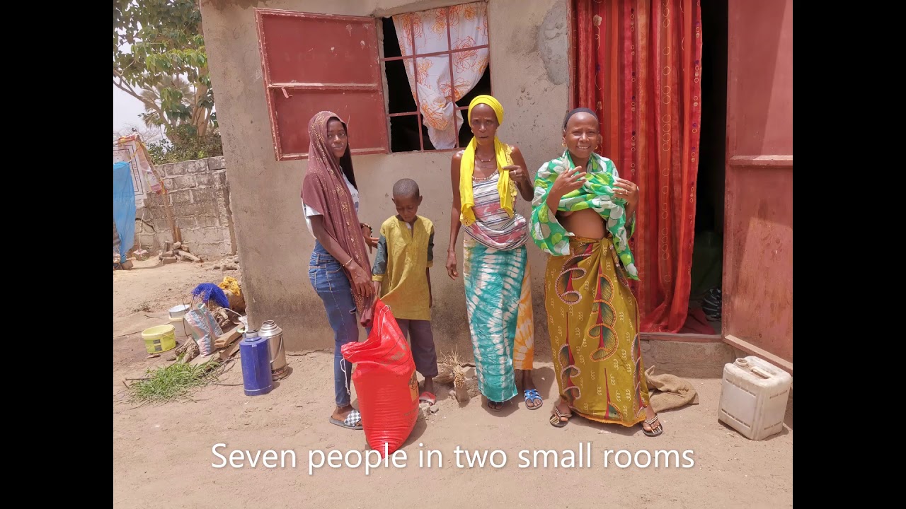 giving out rice during the Covid crisis - YouTube