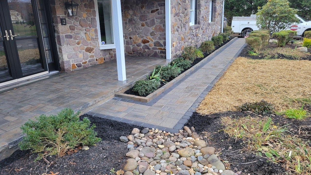 Paver walkway with border and stone edging - YouTube