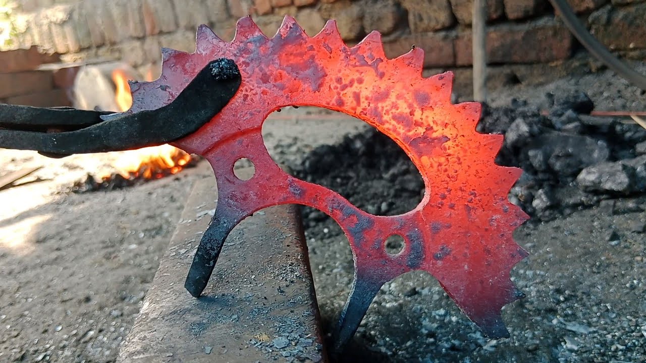 Blacksmith made a miracle axe from a motorcycle sprocket - YouTube