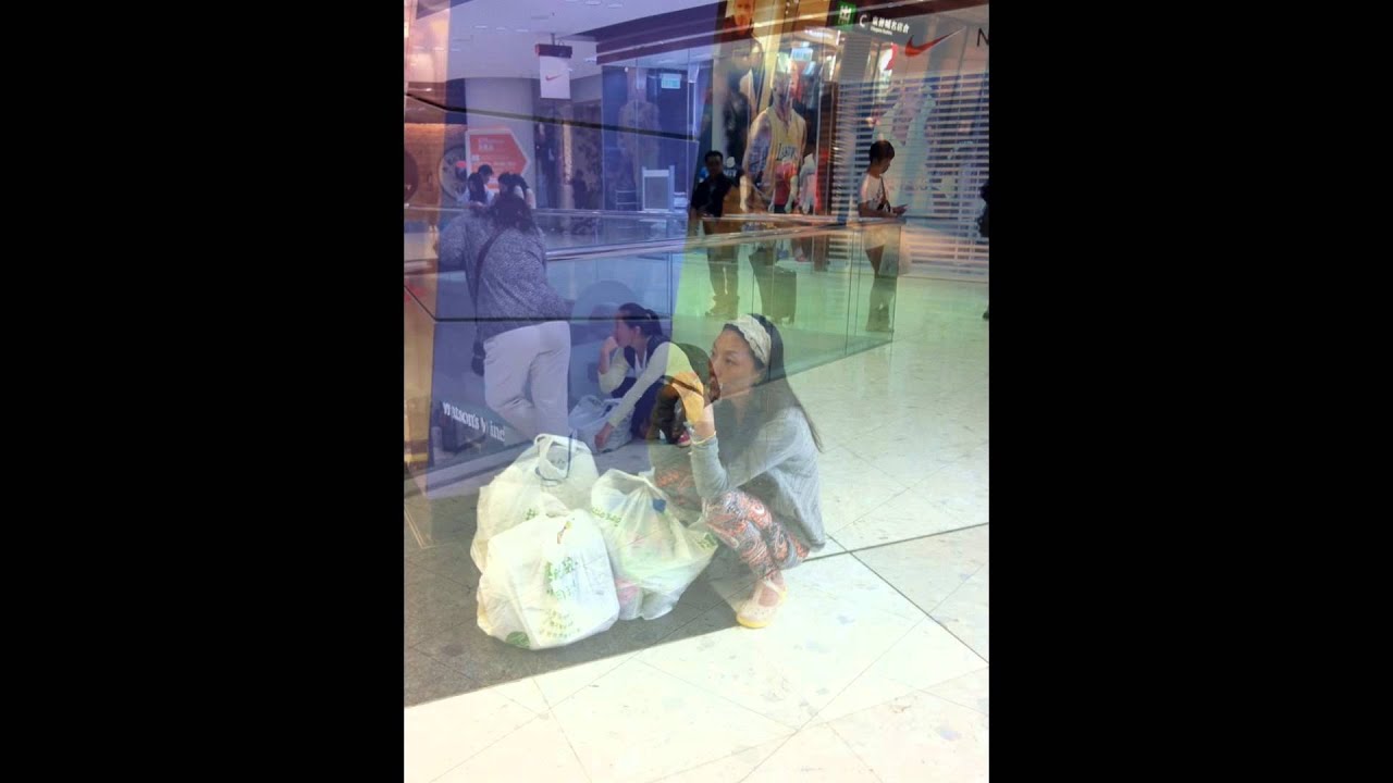 mainland chinese squatting in hong kong malls - YouTube