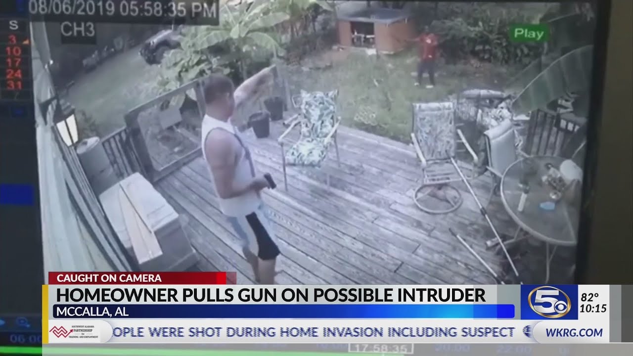 VIDEO: Homeowner pulls gun on intruder - YouTube