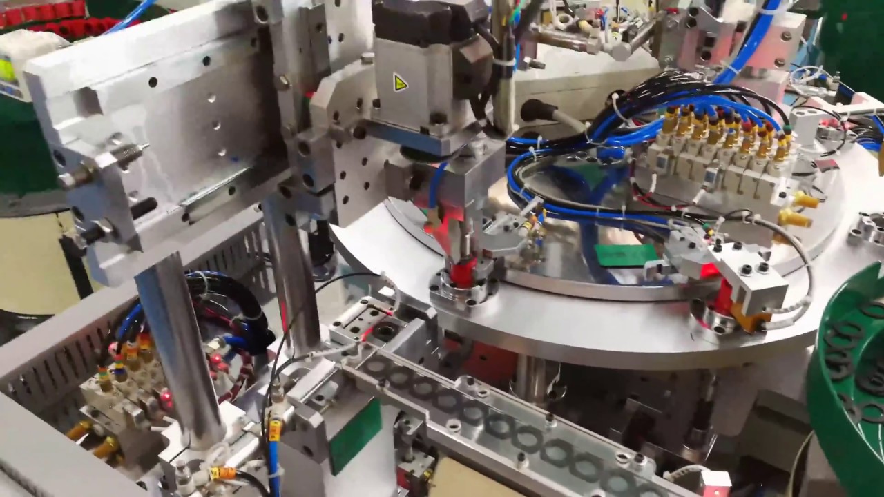 Fully automatic assembly equipment for safety valves（安全阀全自动组装设备） - YouTube