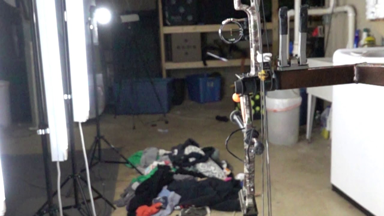 Slow Motion Arrow Being Shot From a Compound Bow - YouTube