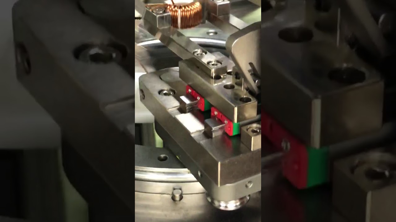 Automatic toroid winding machine - YouTube