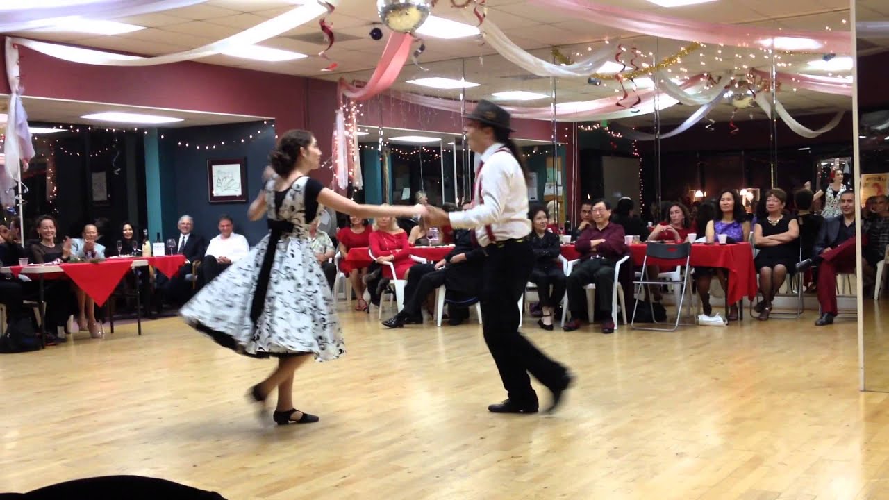 Alec Marken and Sarah Aisha Swing dancing at a Tango holiday dance ...