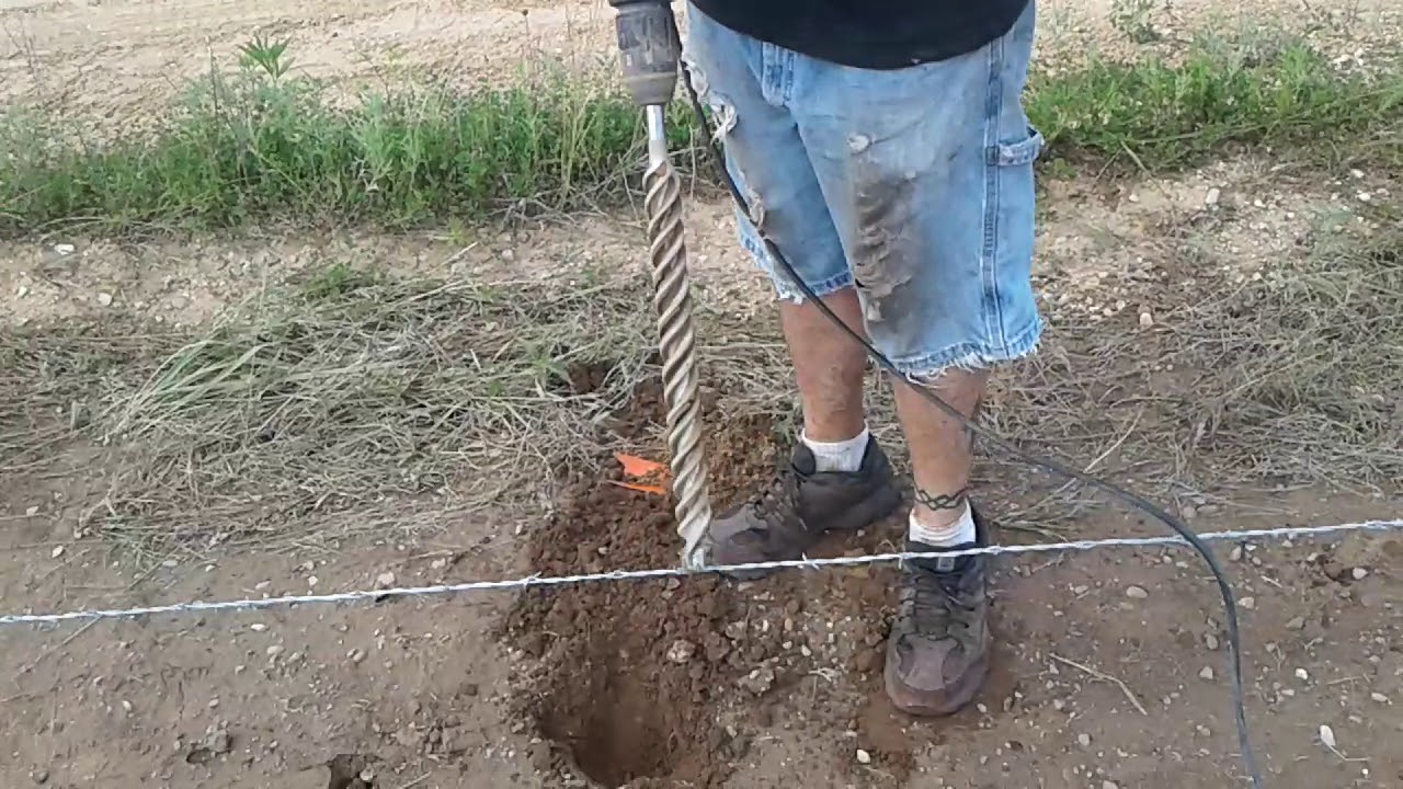 Driving T post in sandstone or rock with a Hilti 1 1/2 drill - YouTube