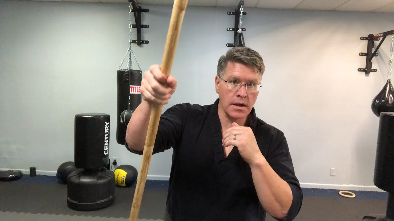 How To Spin A Staff With One Hand And Two Hands - YouTube
