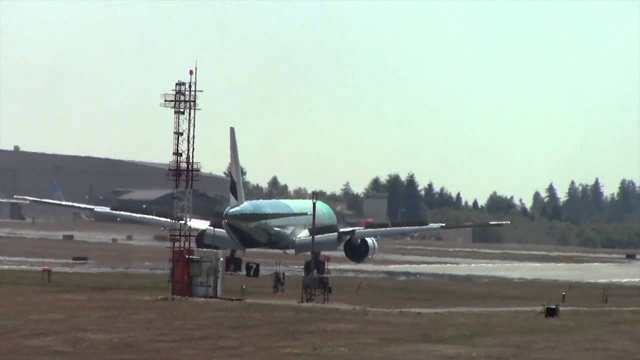 UNPAINTED Emirates Boeing 777-300ER Lands at KPAE Everett, WA 8-6-13 ...