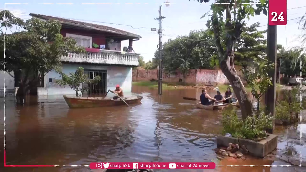 Flooding in Paraguay's capital due to heavy rain - YouTube