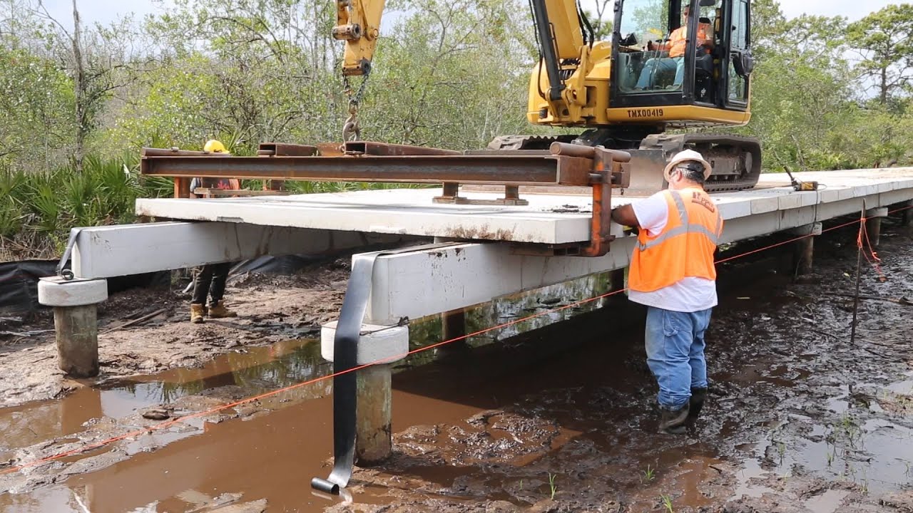 PermaTrak Top Down Construction - Setting Treads with Excavator - YouTube