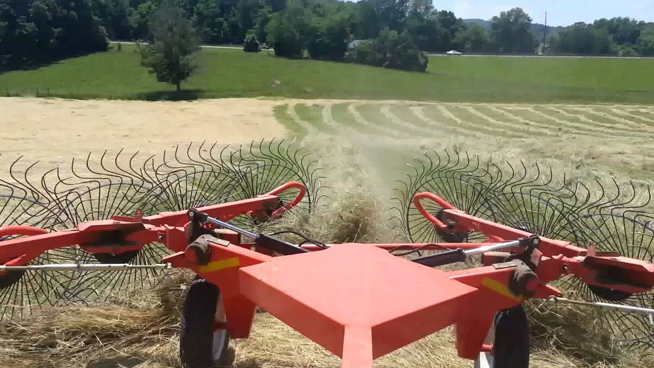 Raking hay 1st cut 2013 - YouTube