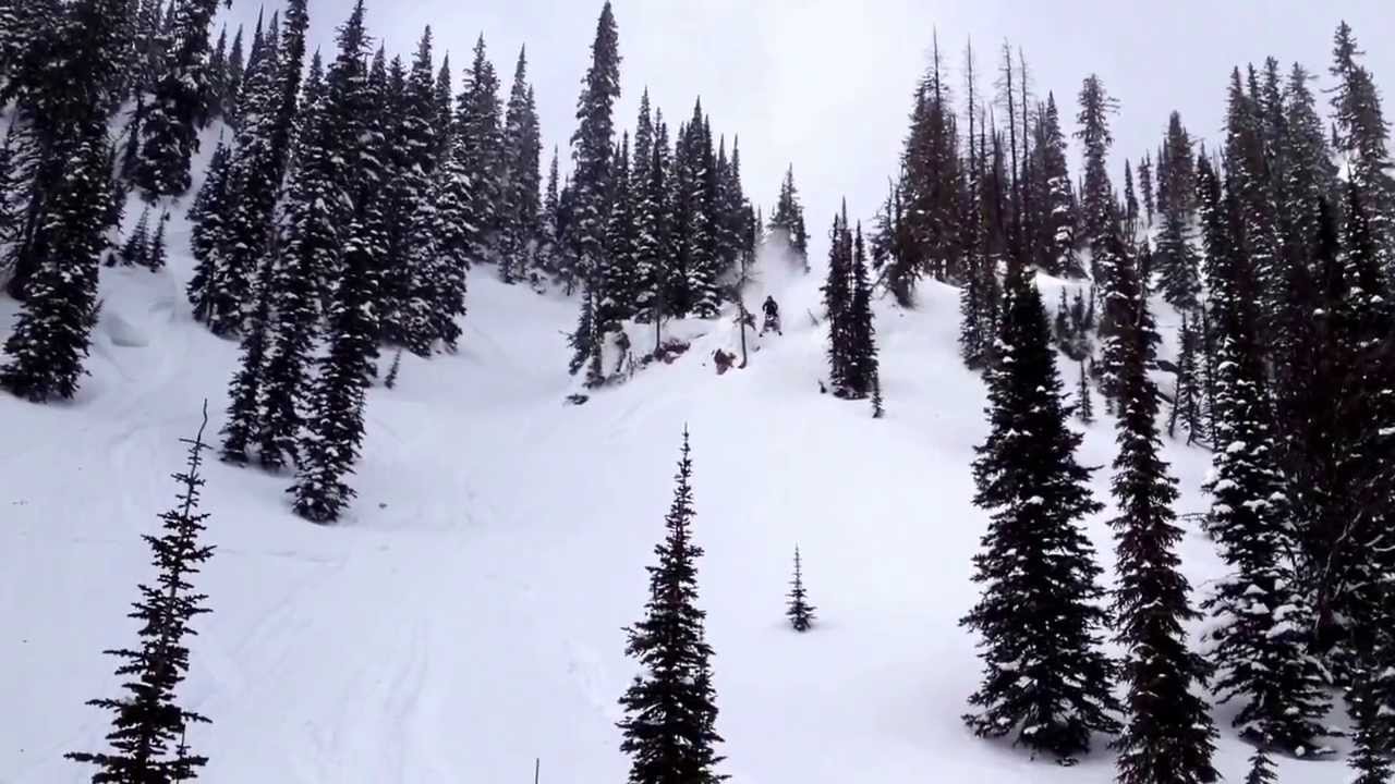Huge snowmobile jumps and cliff drops - YouTube