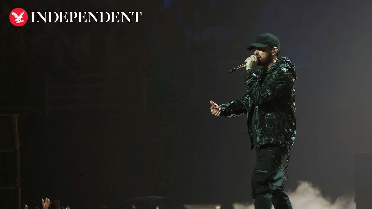 Eminem hits out at Trump in three-word plea to voters at Detroit rally ...