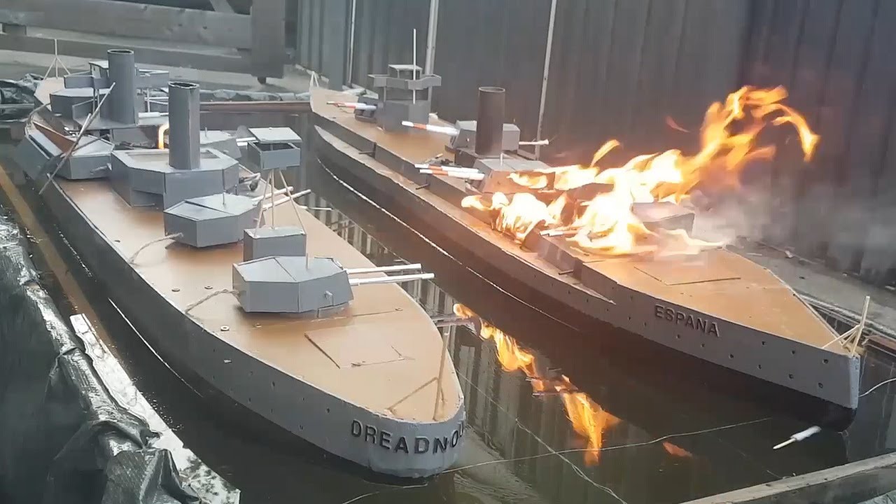 Wooden Model Ship On Fire And Sinking: Battleship Dreadnought Versus ...