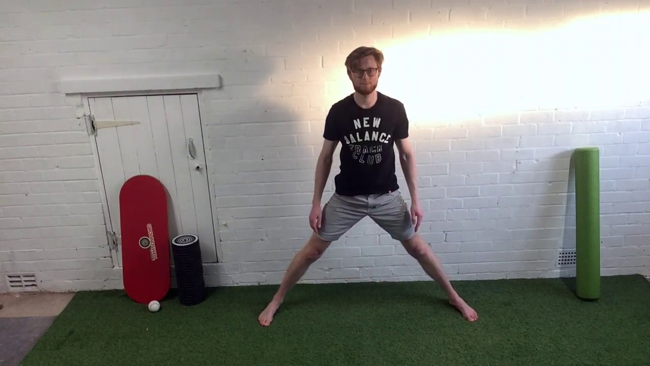 Wide Stance Roll Down Adductor Stretch - YouTube