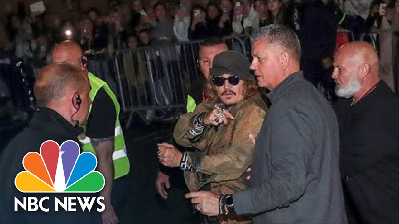 Johnny Depp Greets Adoring Fans At U.K. Concert Venue - YouTube