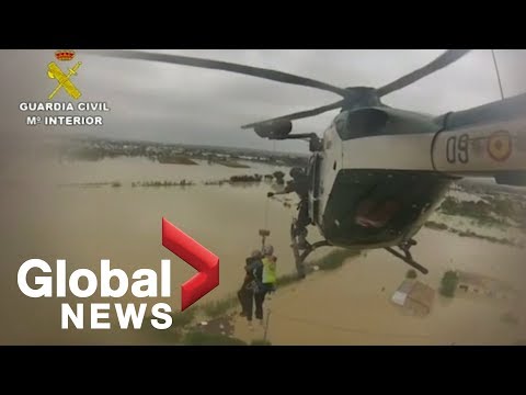 Spain floods: Police rescue baby, stranded flood victims as thousands evacuate to safety