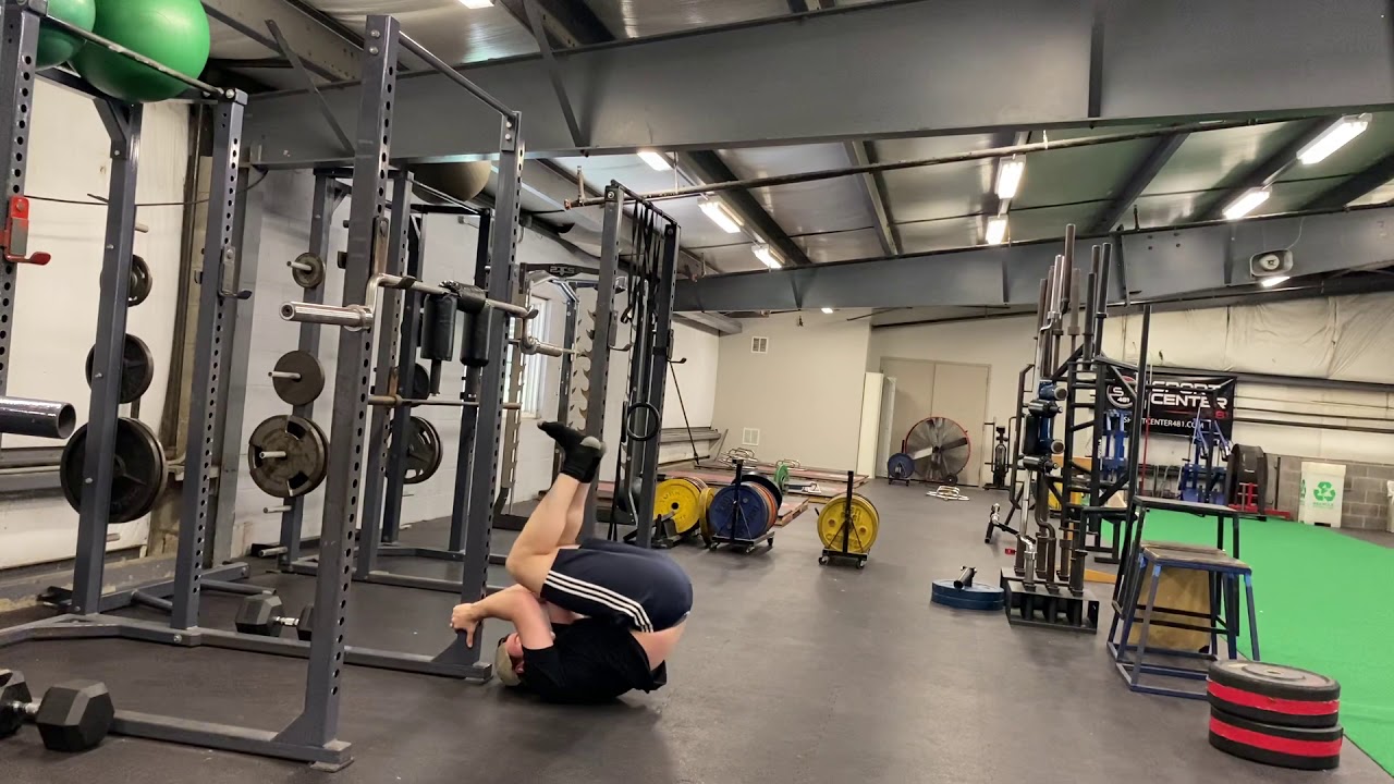 Reverse crunch into hip extension - YouTube