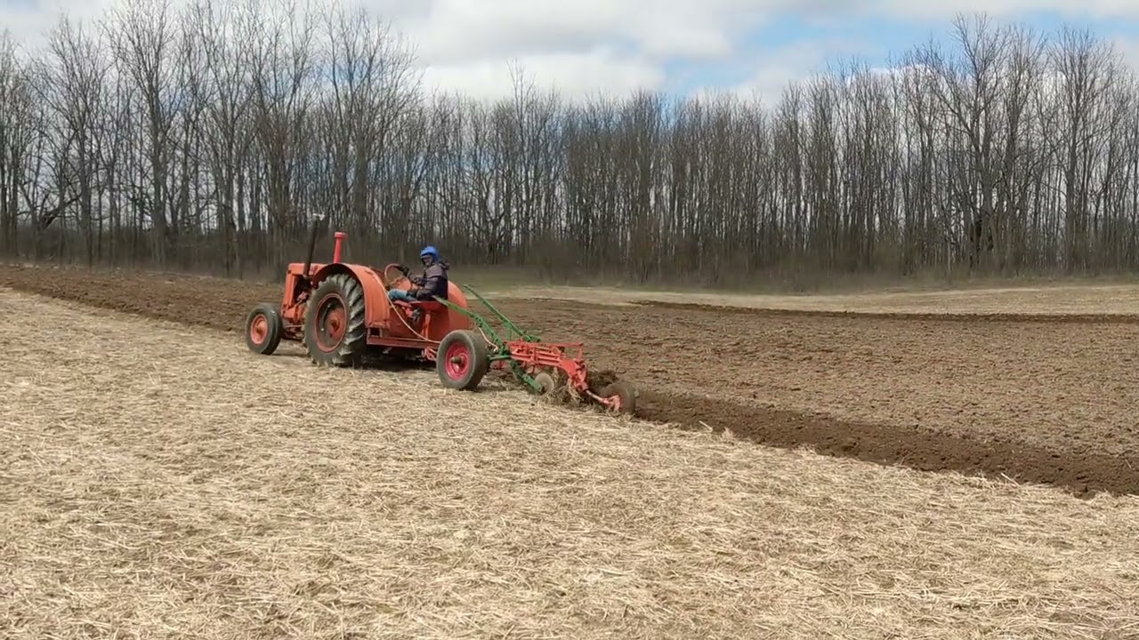 Case L tractor plowing - YouTube