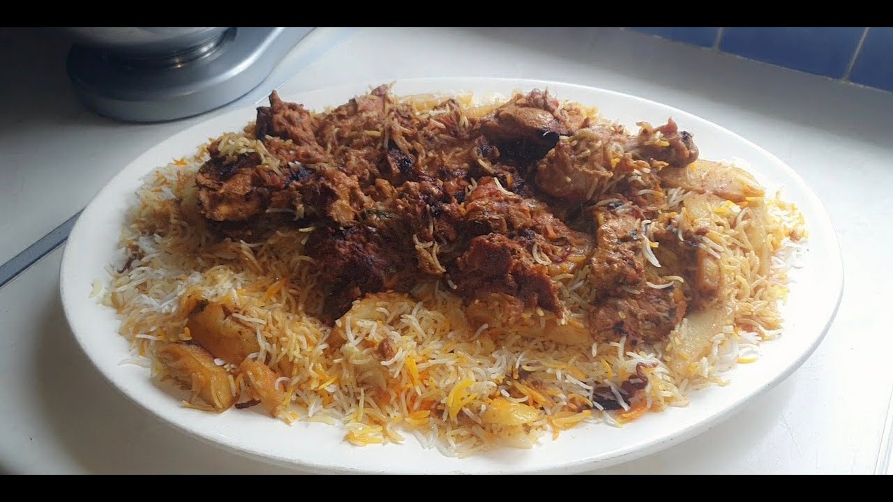 How to make rice with chichen/jinsi ya kupika wali wa kuku mbichi - YouTube