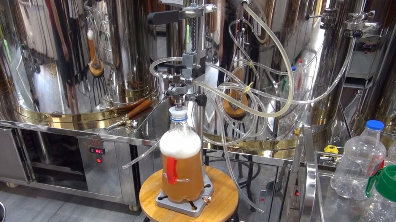 semi automatic beer glass bottle equal level filling machine vacuum ...