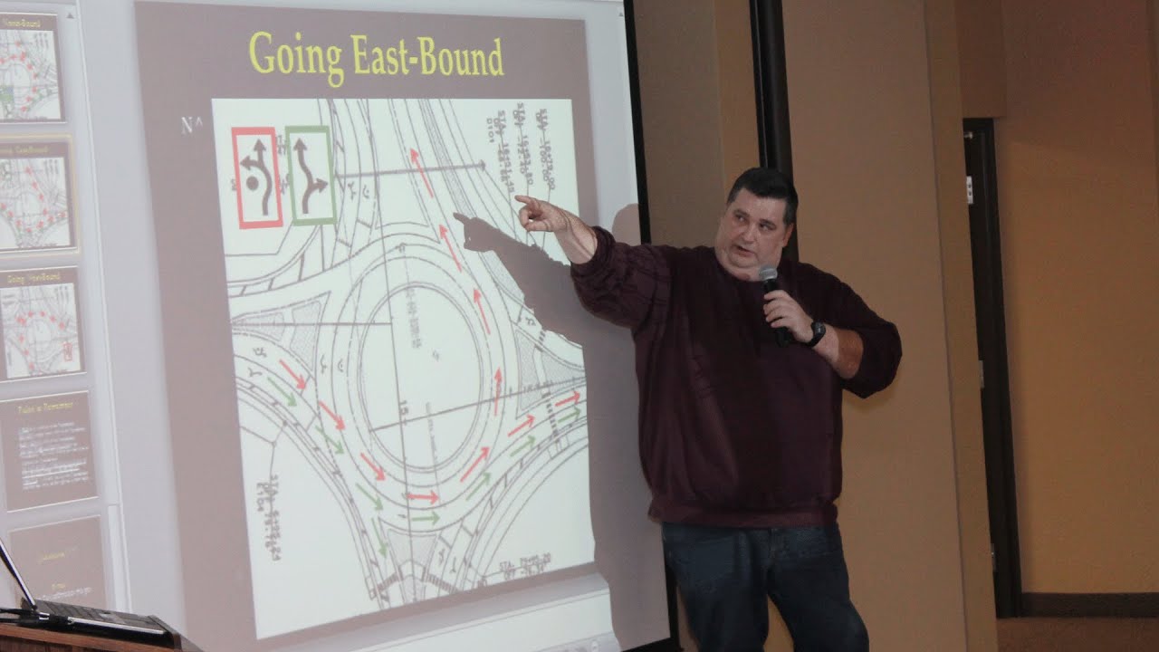 Navigating a Dual Lane Roundabout - YouTube