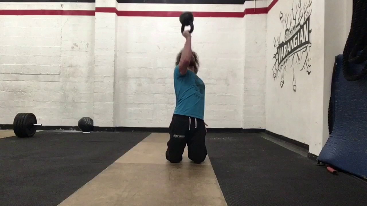 Tall kneeling overhead press with trunk rotation - YouTube
