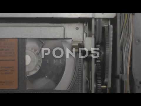 Tape Being Placed Into Vhs Deck Inside - YouTube