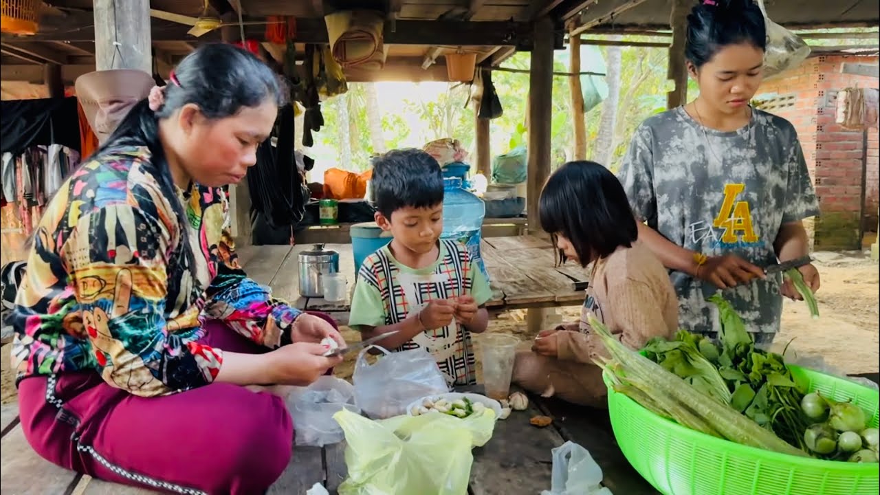 Tuk kroeung with fresh garden vegetables and pork prahok stir fried ...