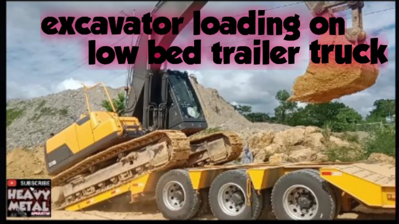 excavator loading on low bed trailer truck - YouTube