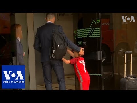 Ronaldo makes young fan's day as Portugal depart for World Cup