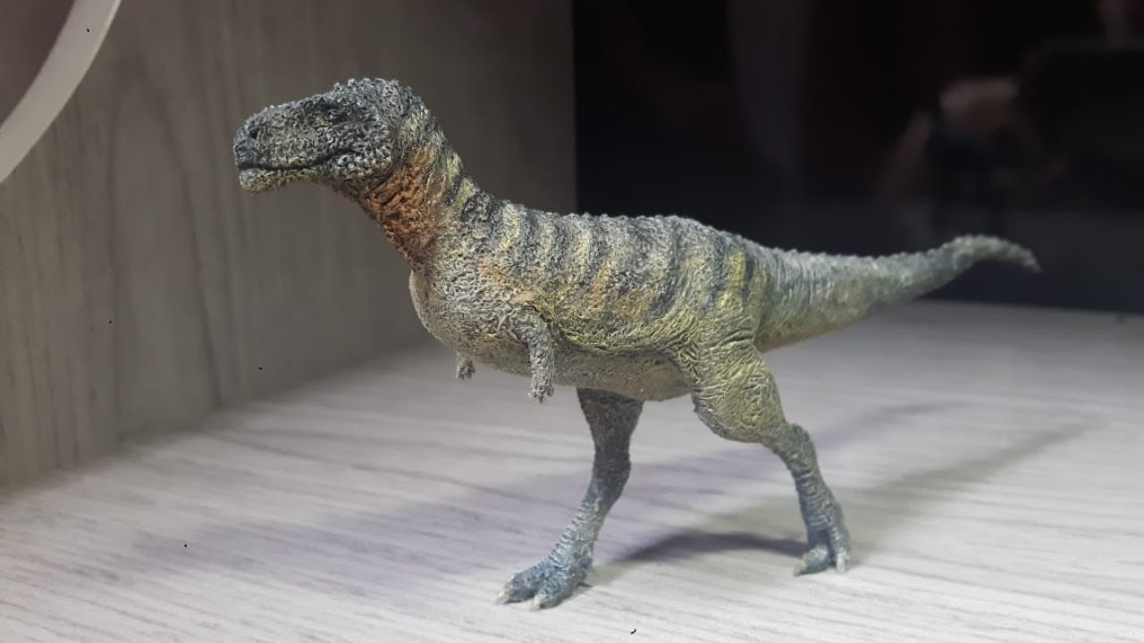 Escultura Spectrovenator ragei em porcelana fria. - YouTube