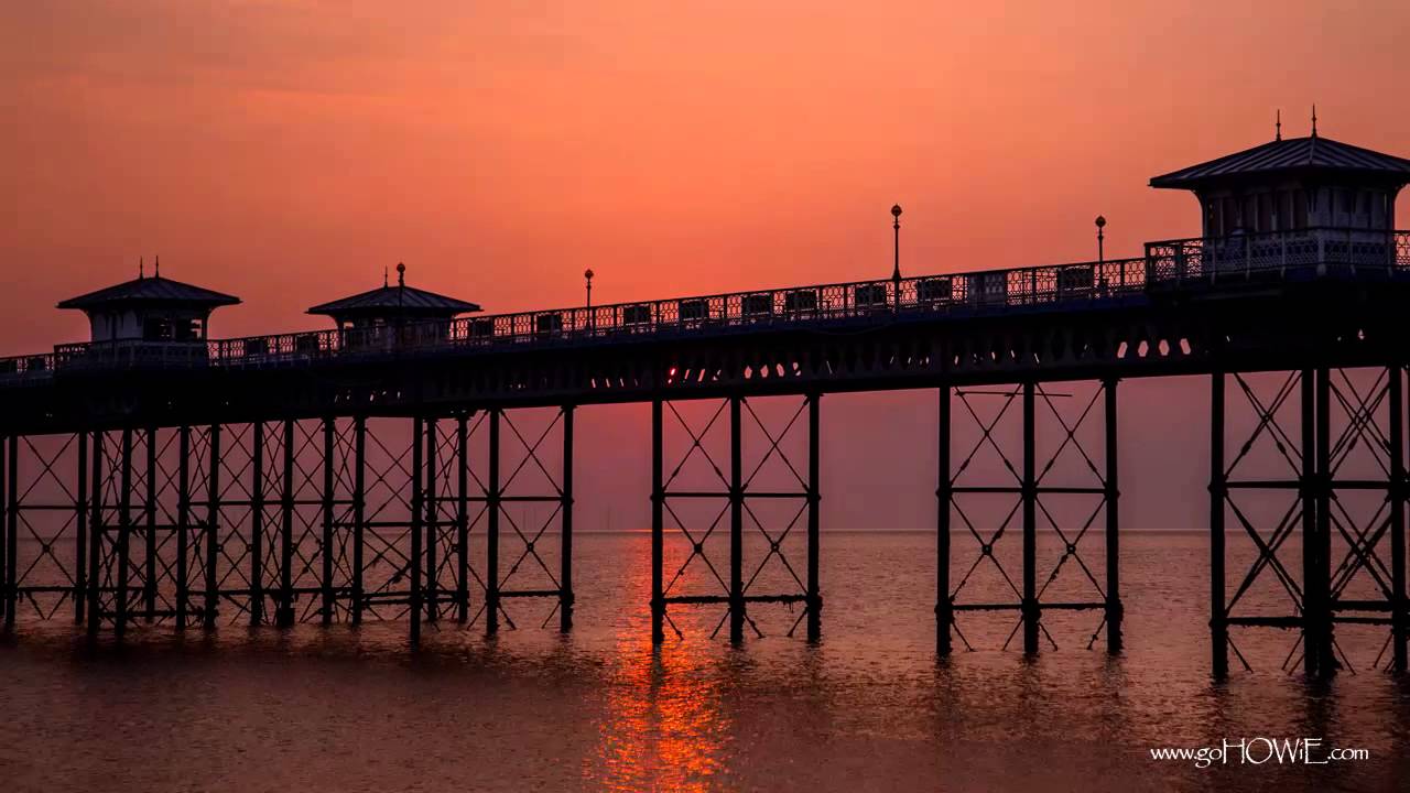 Sunrise over the pier at Llandudno on the North Wales coast - YouTube