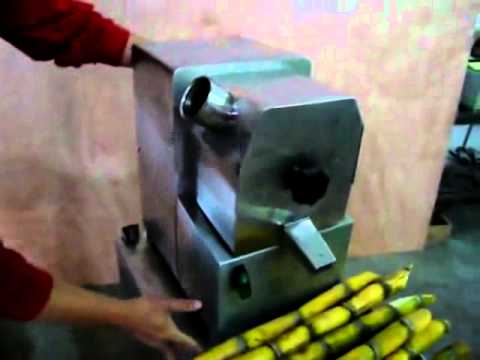Sugar Cane Extractor and Cane Peeler - YouTube