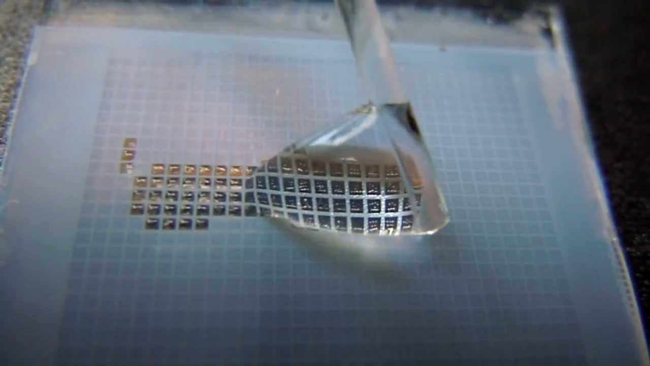 Superhydrophobic-Superhydrophilic Microarray: formation of microarrays of droplets - YouTube