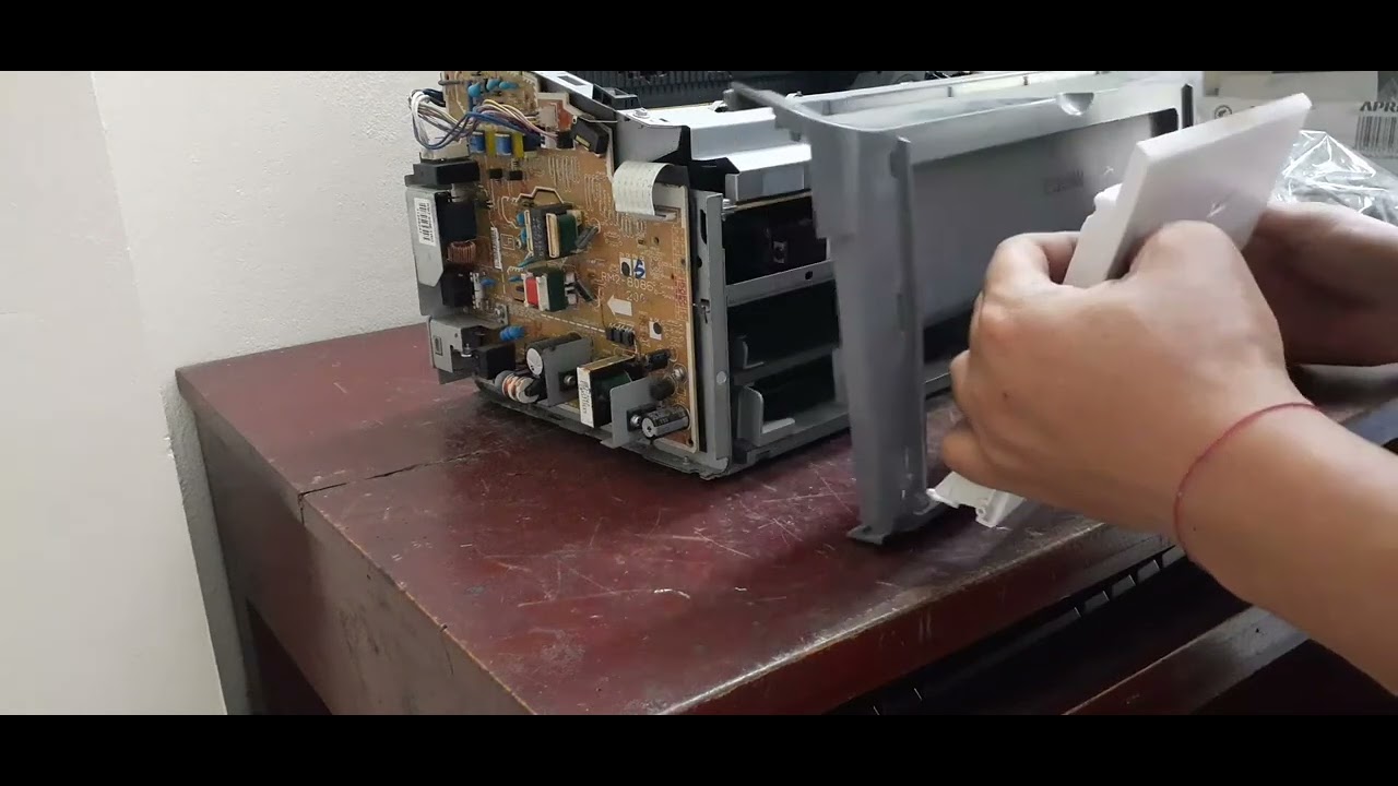 Install the paper tray and clean the Paper Relay of Canon 2900 printer ...
