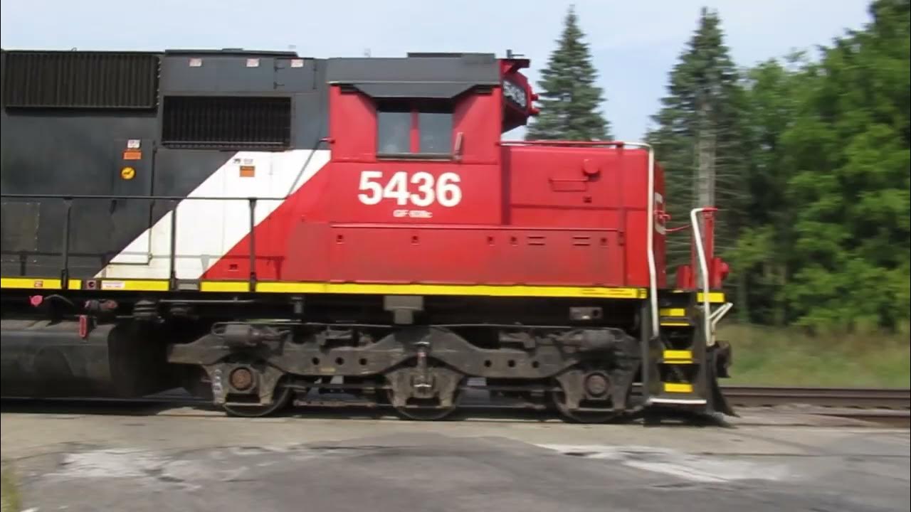 CN 5436 speeds East with the local freight train towards Battle Creek, MI - YouTube