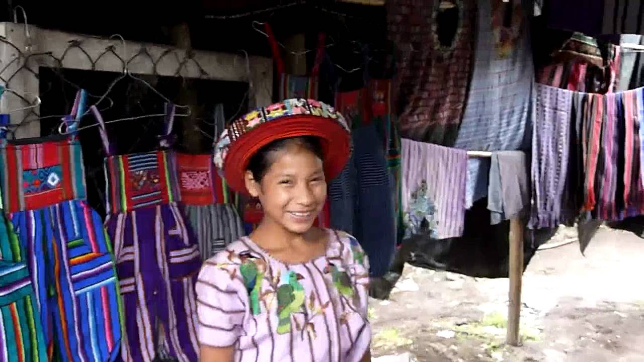 Beautiful Mayan girl wearing traditional hat in village Santiago ...