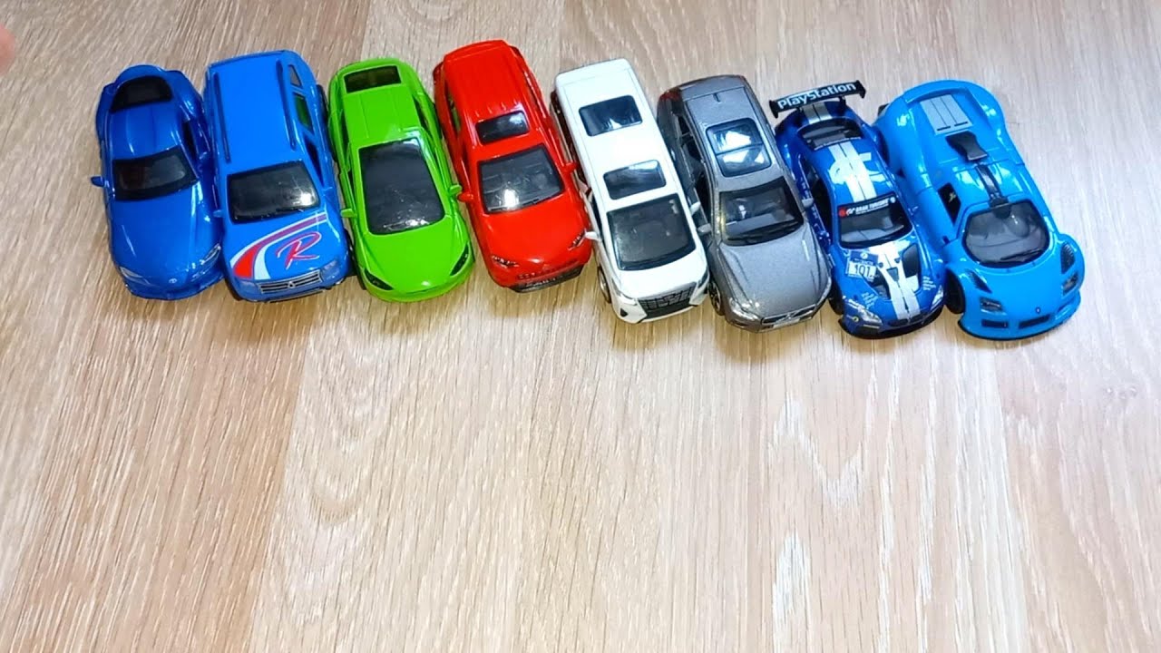 Some small colored car models from a big box - YouTube