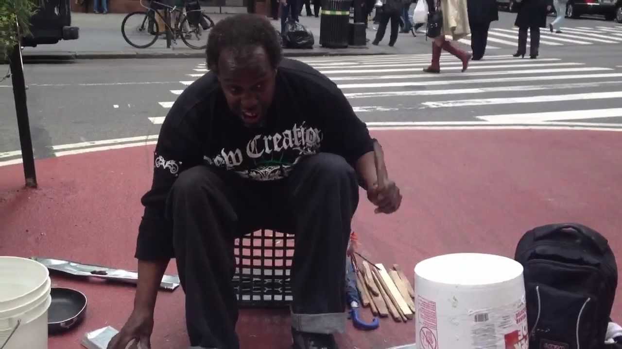 Homeless man plays drums out of garbage in New York City's Garment ...