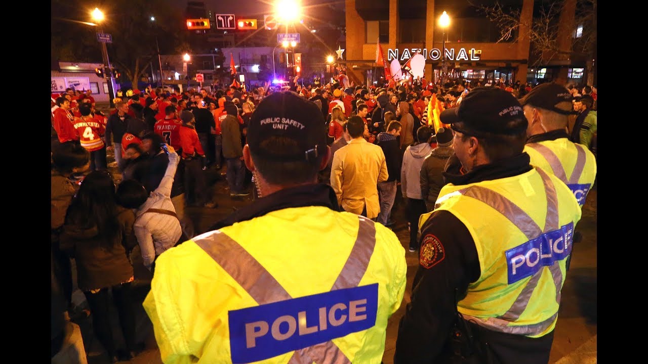 Calgary Police prepare for Flames playoff run along the Red Mile - YouTube