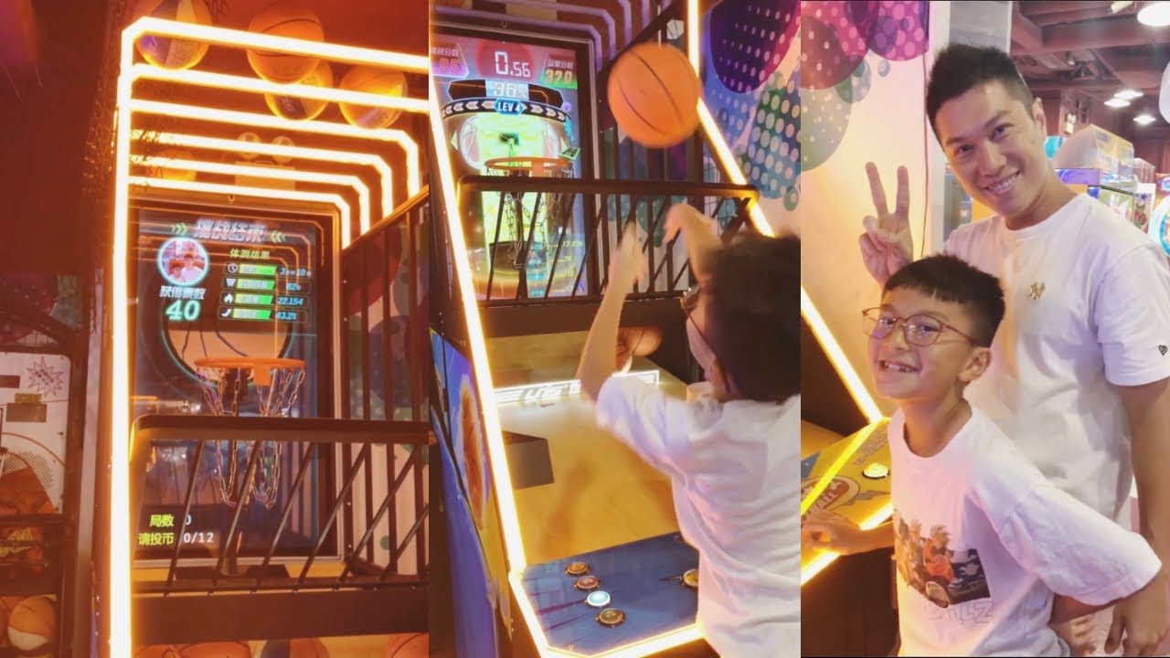 Matthew and dad play basketball machine in HK - YouTube