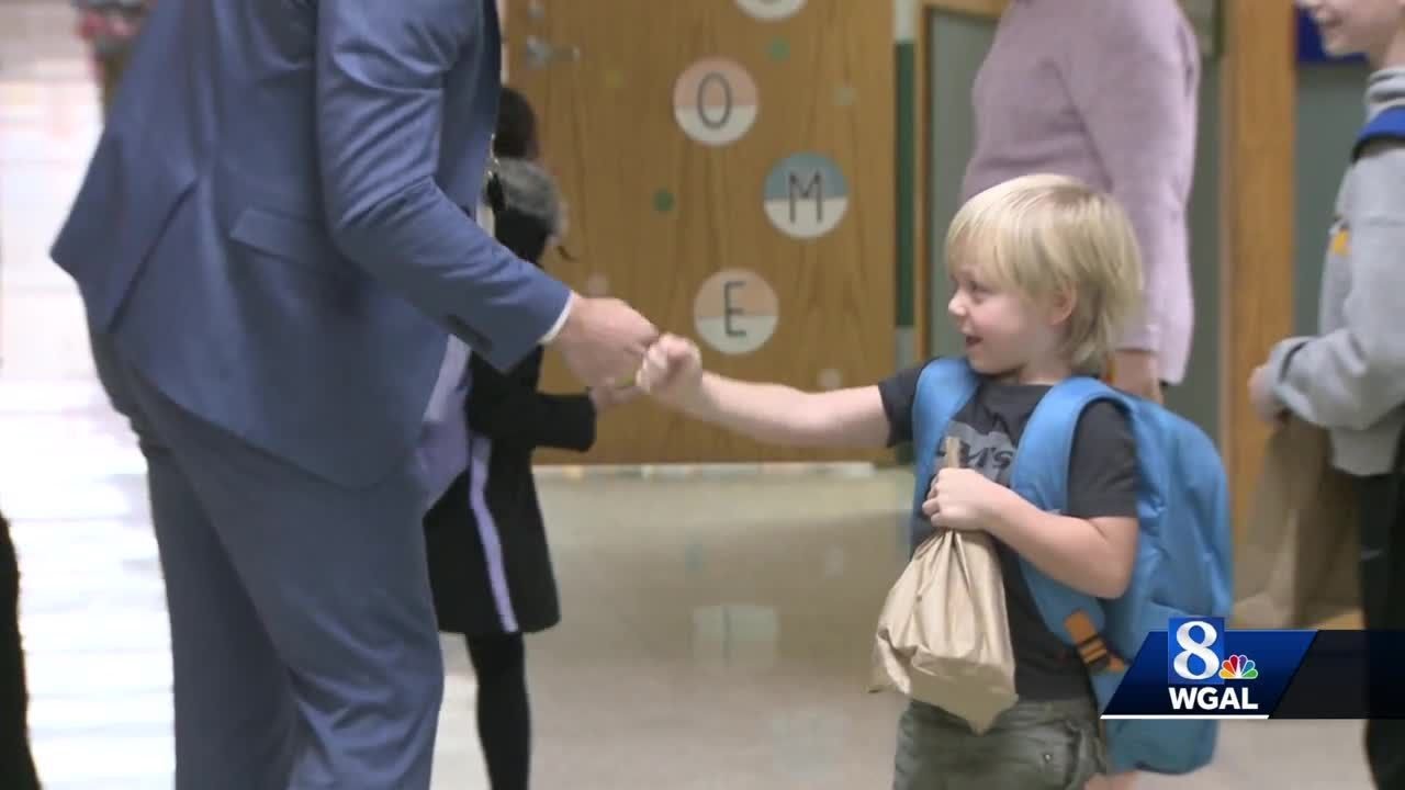 Elementary school hosts 'Fist Bump Friday' - YouTube