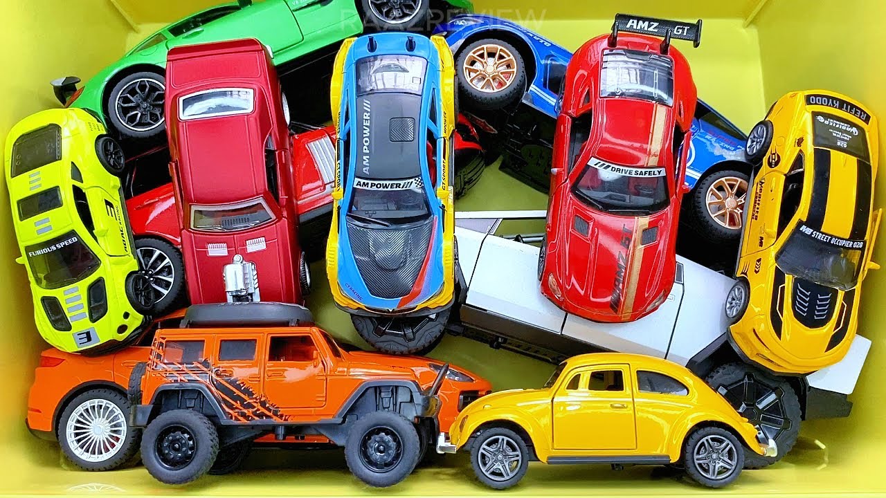 Box full of various miniature cars Peugeot, Volvo, Renault, Hyundai ...