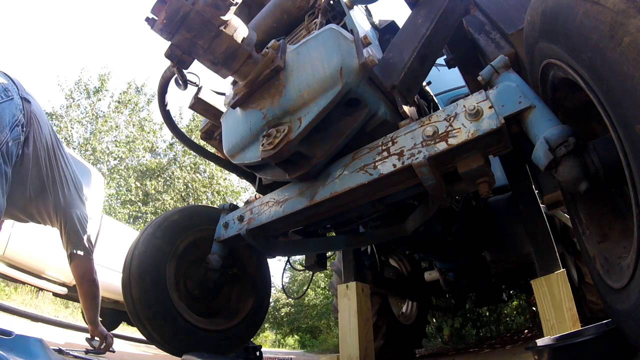 Ford tractor front axle removal - YouTube